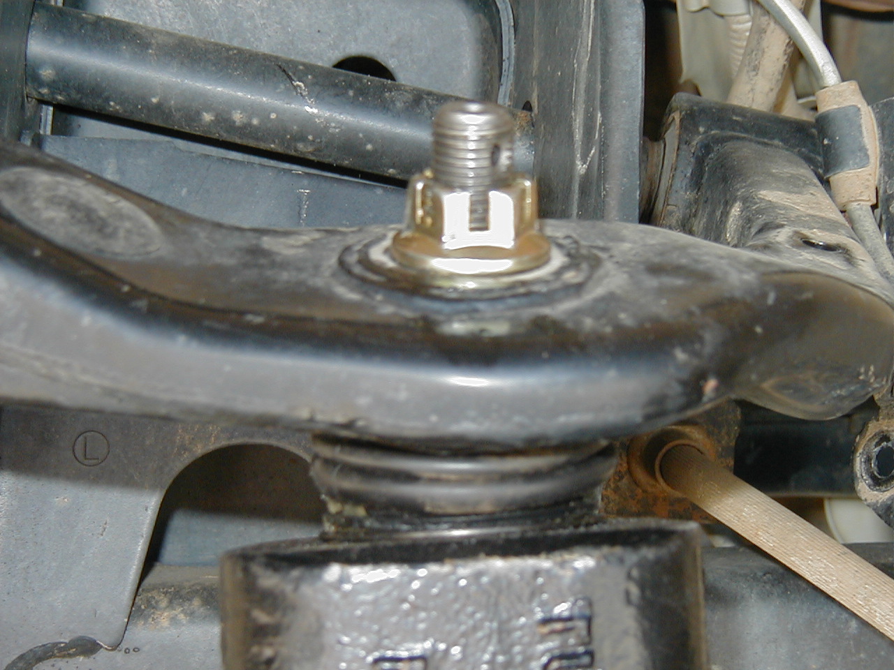 drivers side upper ball joint nut 2